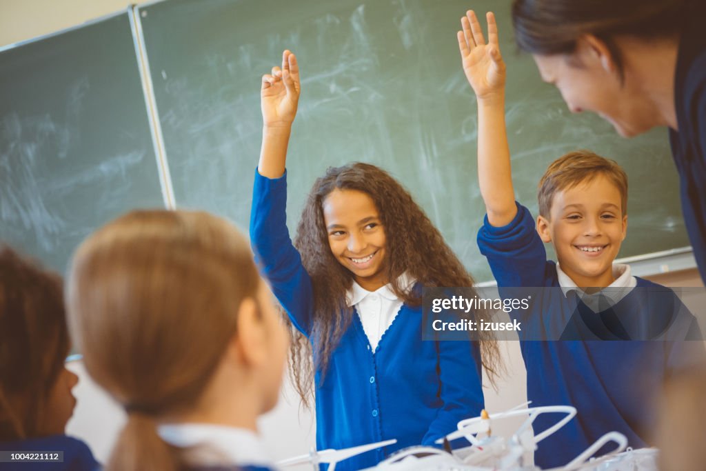 Students Answering Questions In Class High-Res Stock Photo - Getty Images Students Answering Questions In Class High-Res Stock Photo - Getty Images