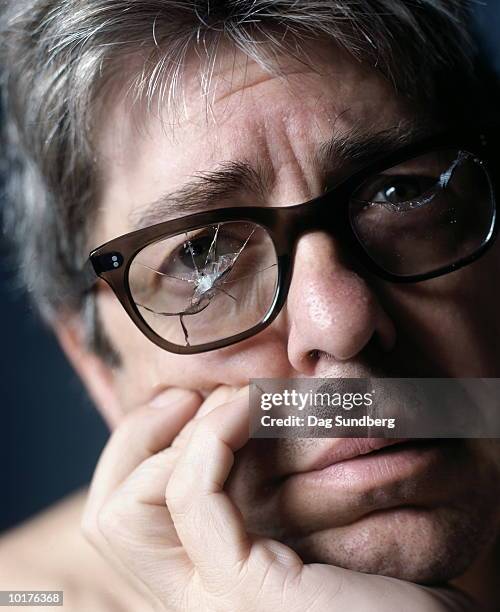Man With Broken Eyeglasses Photos And Premium High Res Pictures Getty Images