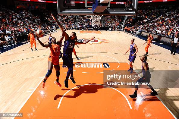 Chiney Ogwumike Of The Connecticut Sun Goes To The Basket Against The