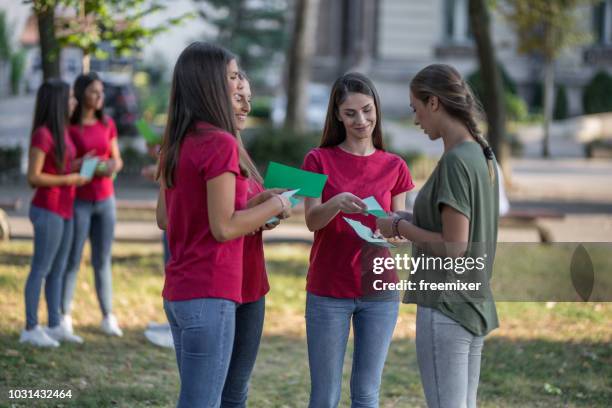 Handing Out Flyers Outside Photos And Premium High Res Pictures Getty Images