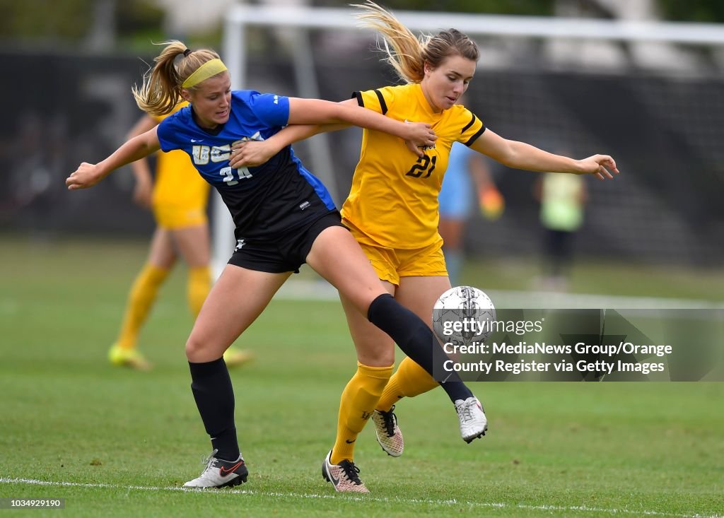 Ucsb’s Mallory Hromatko Left And Lbsu’s Alyssa Alvarez