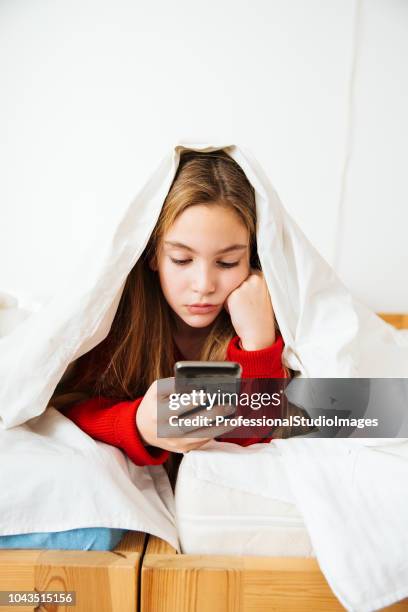 Girl Looking Under Bed Photos And Premium High Res Pictures Getty Images