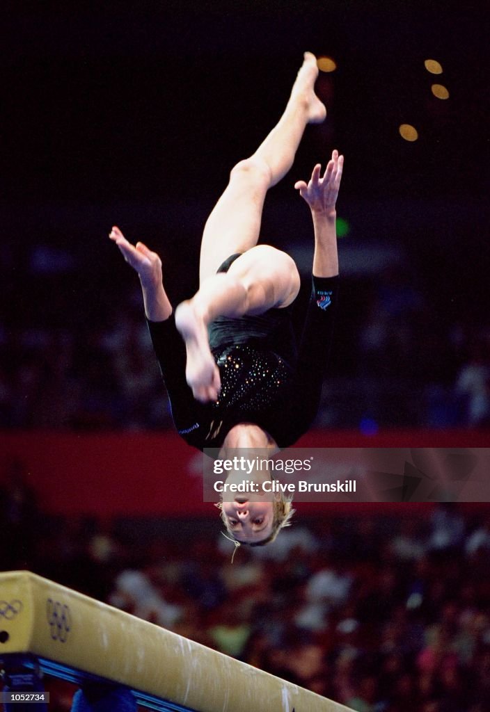 Svetlana Khorkina Of Russia In Action On The Beam During The Womens