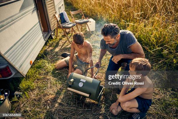 Father Son Smoking Photos And Premium High Res Pictures Getty Images