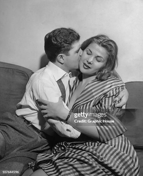 Couple Making Out On Couch Bw Photos And Premium High Res Pictures