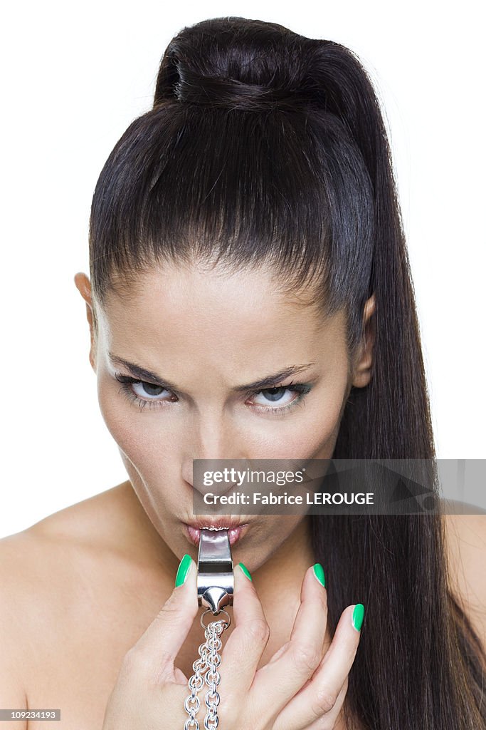 Young Woman Blowing Whistle High-Res Stock Photo - Getty Images Young Woman Blowing Whistle High-Res Stock Photo - Getty Images