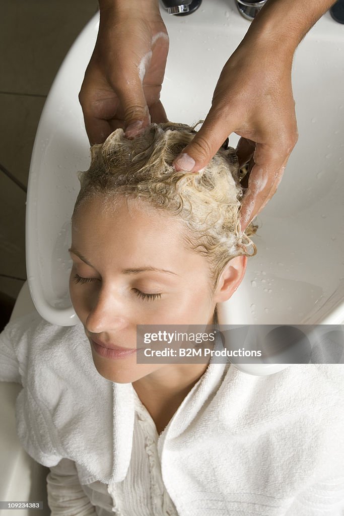 Man Washing Womans Hair In Salon Photo Getty Images