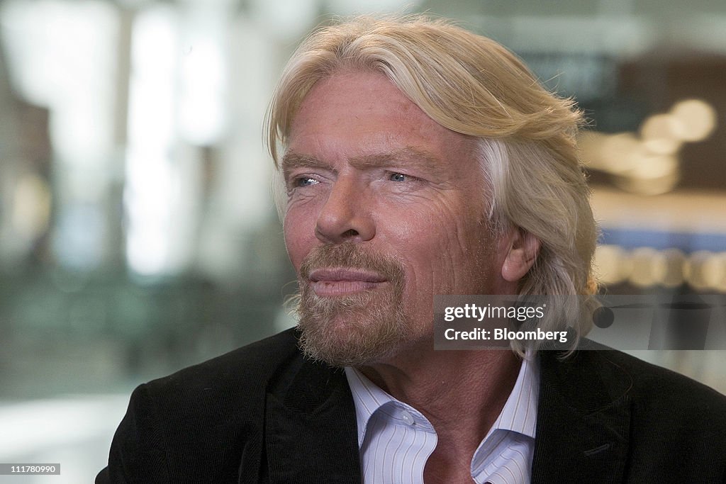 Richard Branson Founder And Chairman Of Virgin Group Ltd Pauses