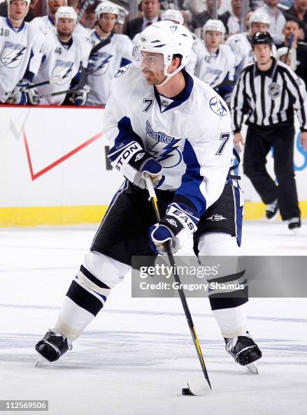 Brett Clark Of The Tampa Bay Lightning Moves The Puck Against The