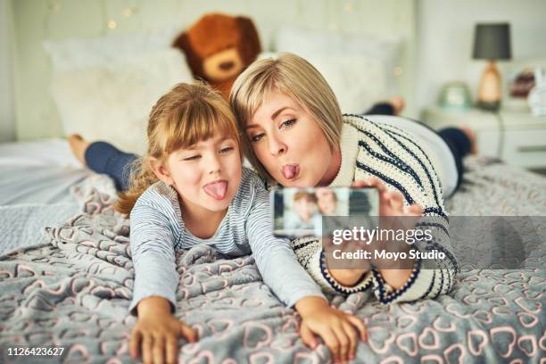 Mom Daughter Tongue Photos And Premium High Res Pictures Getty Images