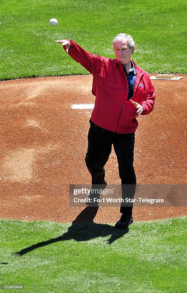 Former President George W Bush Throws Out The First Pitch By Nolan