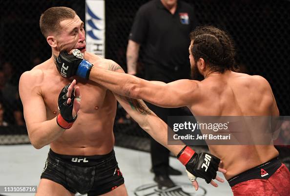 Jorge Masvidal Punches Darren Till Of England In Their Welterweight