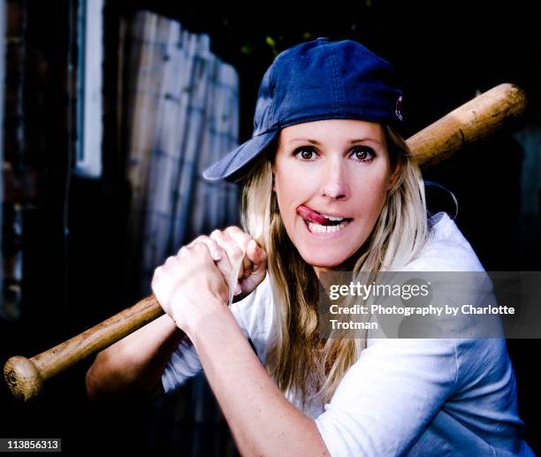 Woman Baseball Bat Photos And Premium High Res Pictures Getty Images