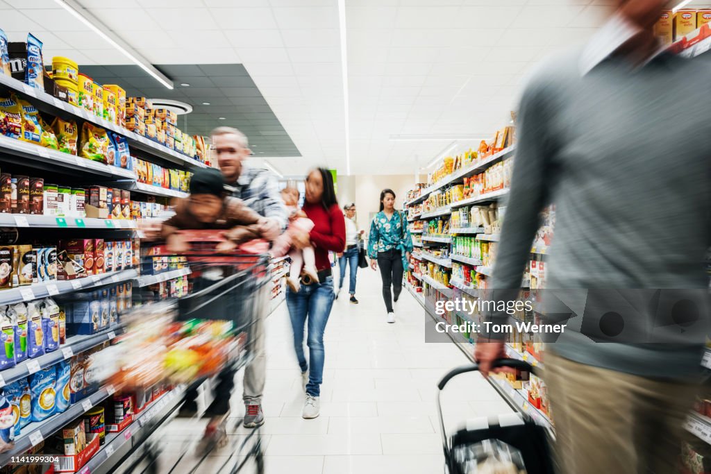 Busy Supermarket Aisle With Customers High-Res Stock Photo - Getty Images Busy Supermarket Aisle With Customers High-Res Stock Photo - Getty Images