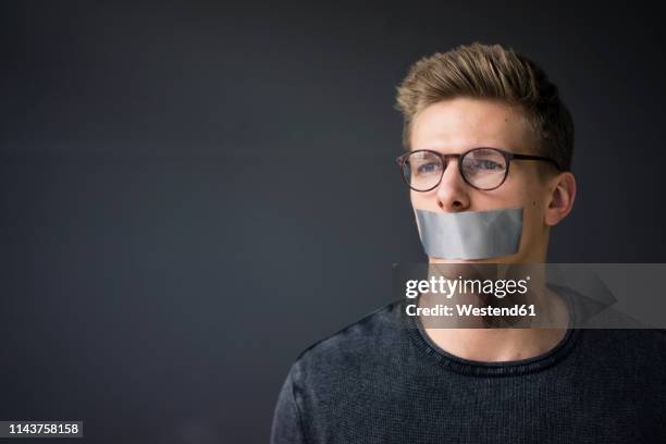 Taped Up Mouth Photos And Premium High Res Pictures Getty Images