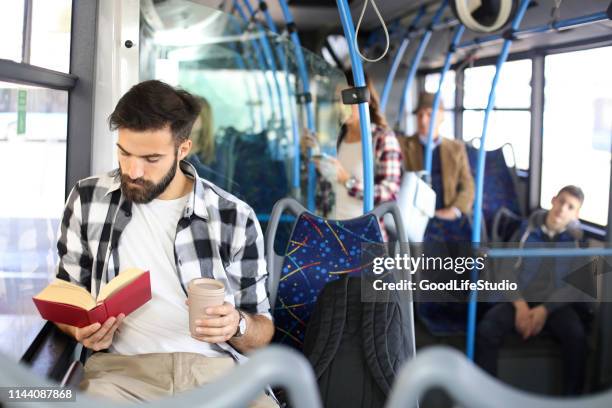 Man Reading Book On Bus Photos and Premium High Res Pictures - Getty Images Man Reading Book On Bus Photos and Premium High Res Pictures - Getty Images