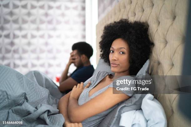 Woman And Man In Bed Facing Camera Sitting Up Photos And Premium High