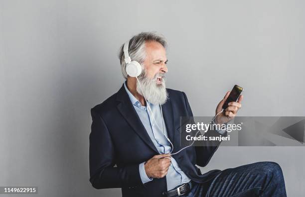Old Man Listening To Radio Photos And Premium High Res Pictures Getty