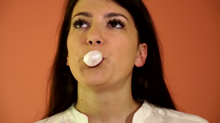 63 Girl Blowing Bubble Gum Stock Videos Footage And 4k Video Clips Getty Images