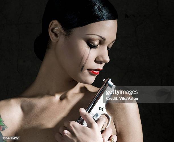 Pin Up Girl With Gun Photos And Premium High Res Pictures Getty Images