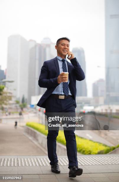 Asian Business Man Walking Full Body Photos And Premium High Res