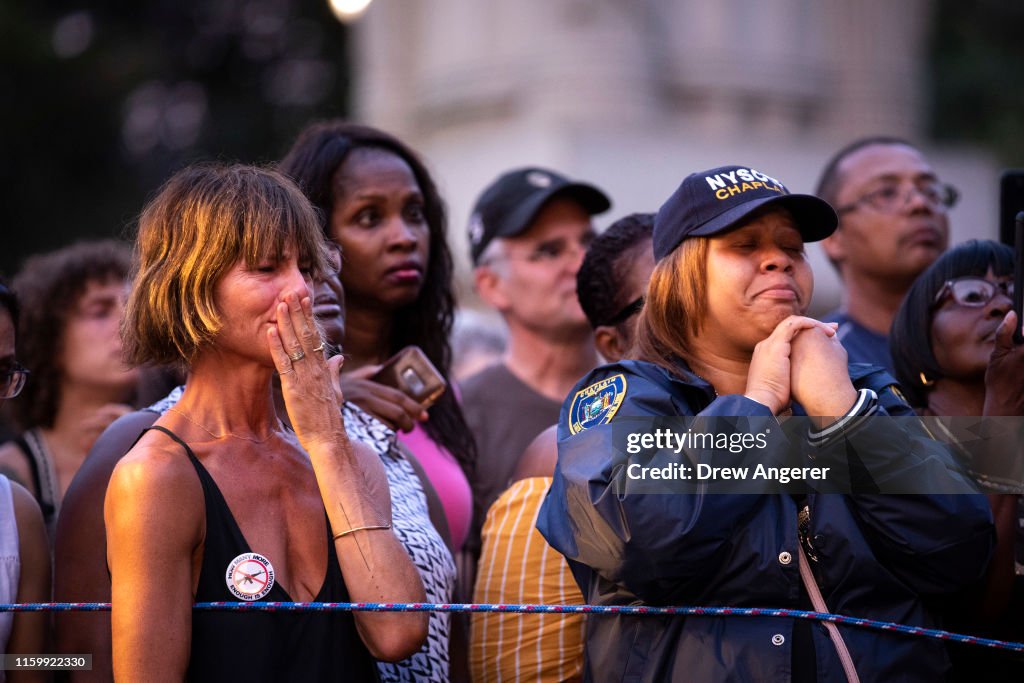 People Attend A Vigil For The Victims Of The Recent Mass Shootings In