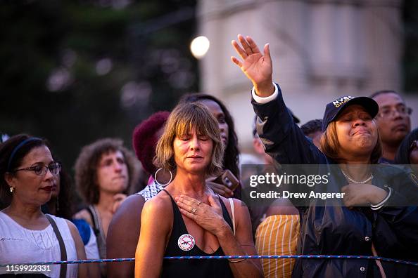 People Attend A Vigil For The Victims Of The Recent Mass Shootings In