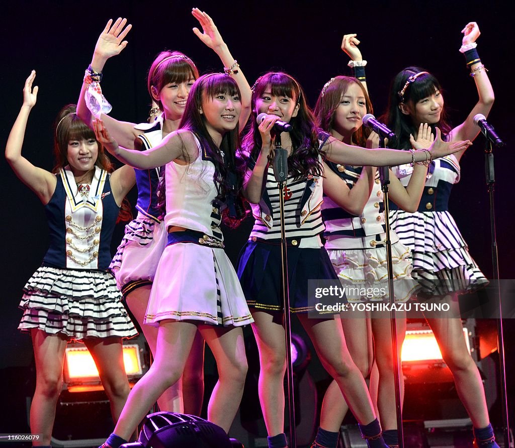 Japanese All Girl Pop Group Akb48 Members Performs At A Charity News
