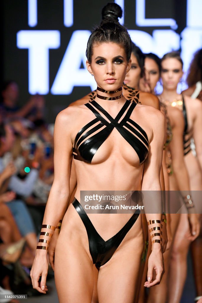 Models Walk The Runway For Black Tape Project At Miami Swim Week