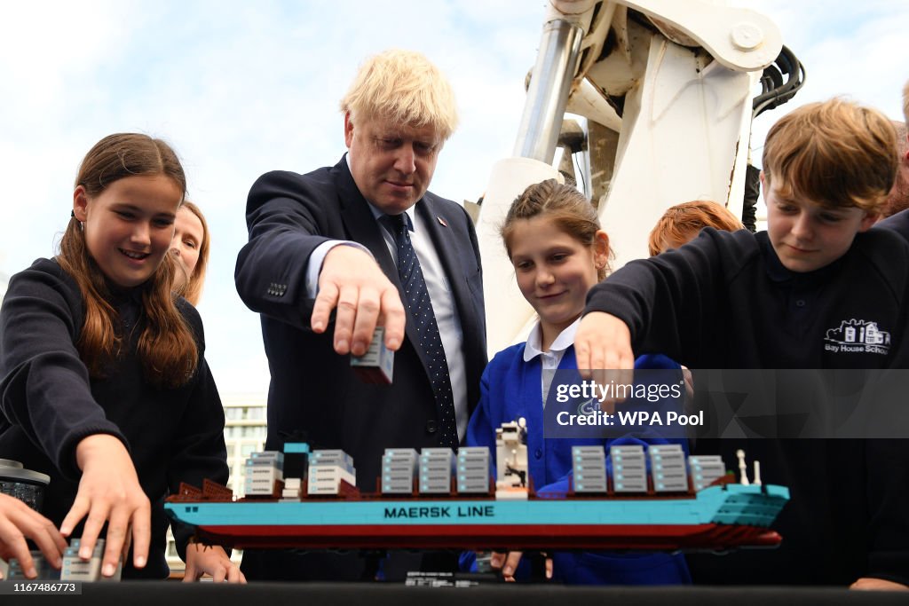 U.K. Prime Minister Boris Johnson takes part in an activity with ... U.K. Prime Minister Boris Johnson takes part in an activity with ...