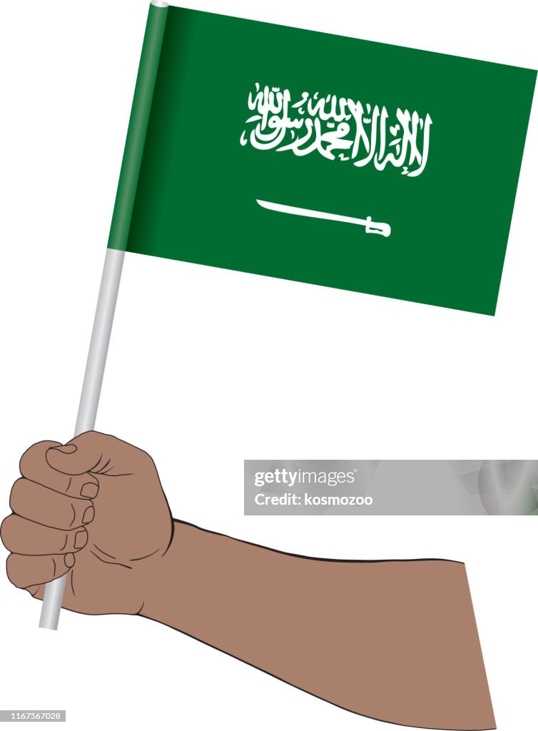 Hand Holding National Flag Of Saudi Arabia High Res Vector Graphic