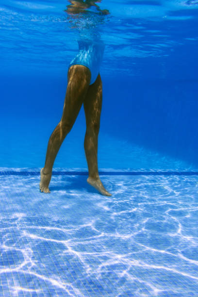 One Piece Swimsuit Underwater Photos And Premium High Res Pictures