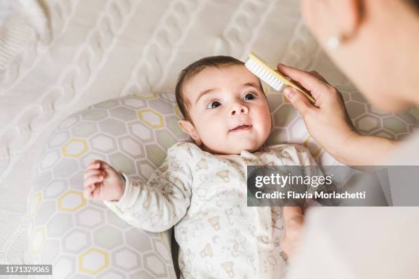 Mother Combing Sons Hair Photos and Premium High Res Pictures - Getty ... Mother Combing Sons Hair Photos and Premium High Res Pictures - Getty ...
