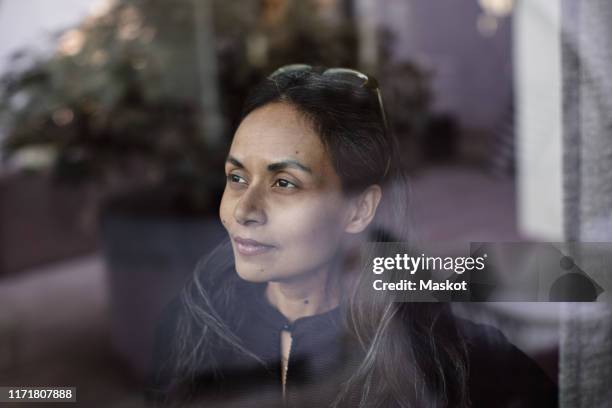 Woman Through Glass Photos And Premium High Res Pictures Getty Images
