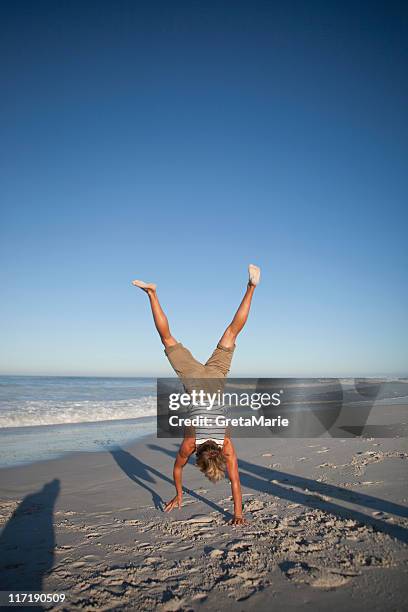 Boy Doing Handstand Photos and Premium High Res Pictures - Getty Images Boy Doing Handstand Photos and Premium High Res Pictures - Getty Images