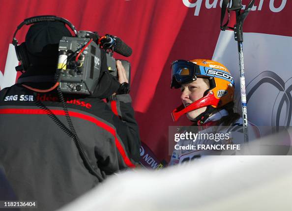 Croatian gold medalist Janica Kostelic grimaces because of a knee ... Croatian gold medalist Janica Kostelic grimaces because of a knee ...