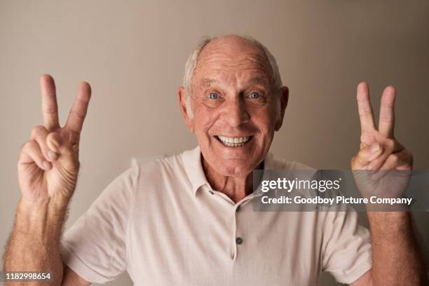 Old Man Peace Sign Photos And Premium High Res Pictures Getty Images