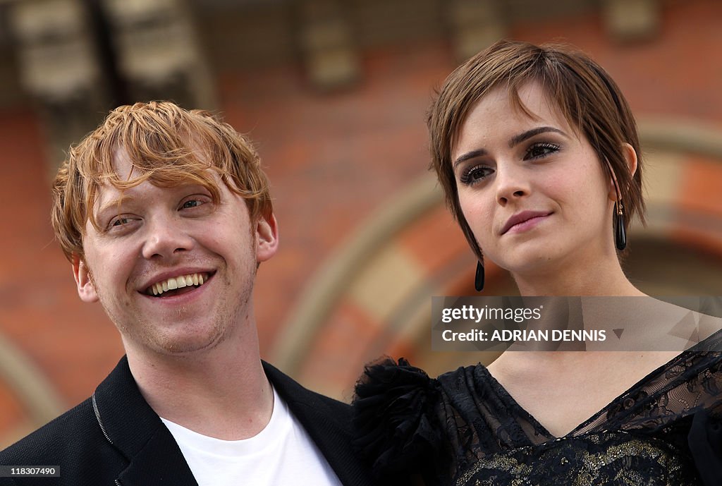 Rupert Grint And Emma Watson Pose During A Photocall Outside St