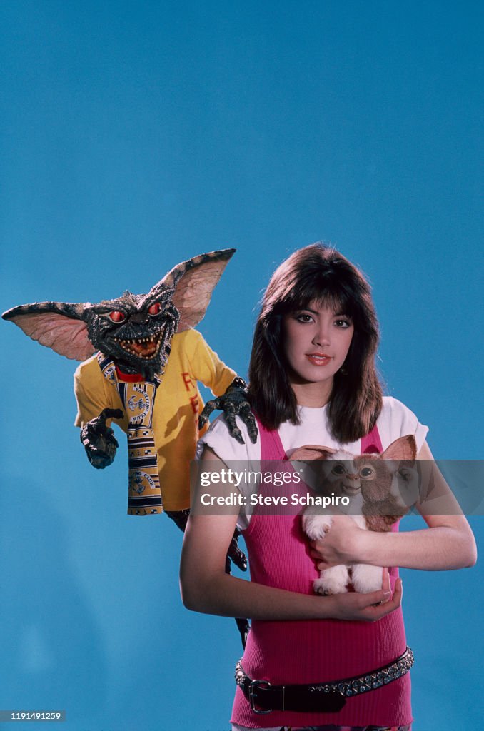Portrait Of American Actress Phoebe Cates As She Poses With Pair Of