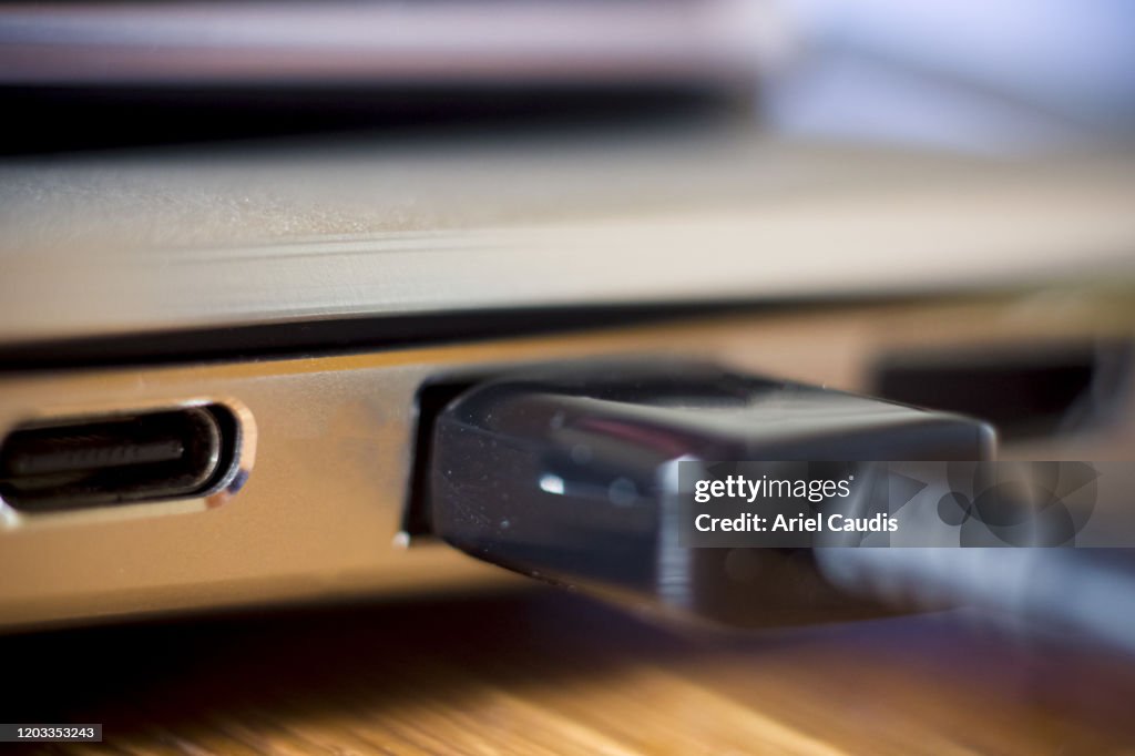 Usb Phone Cable Plugged Into Laptop High-Res Stock Photo - Getty Images Usb Phone Cable Plugged Into Laptop High-Res Stock Photo - Getty Images