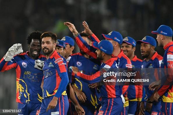 Karachi Kings Pacer Mohammad Amir Celebrates With Teammates After