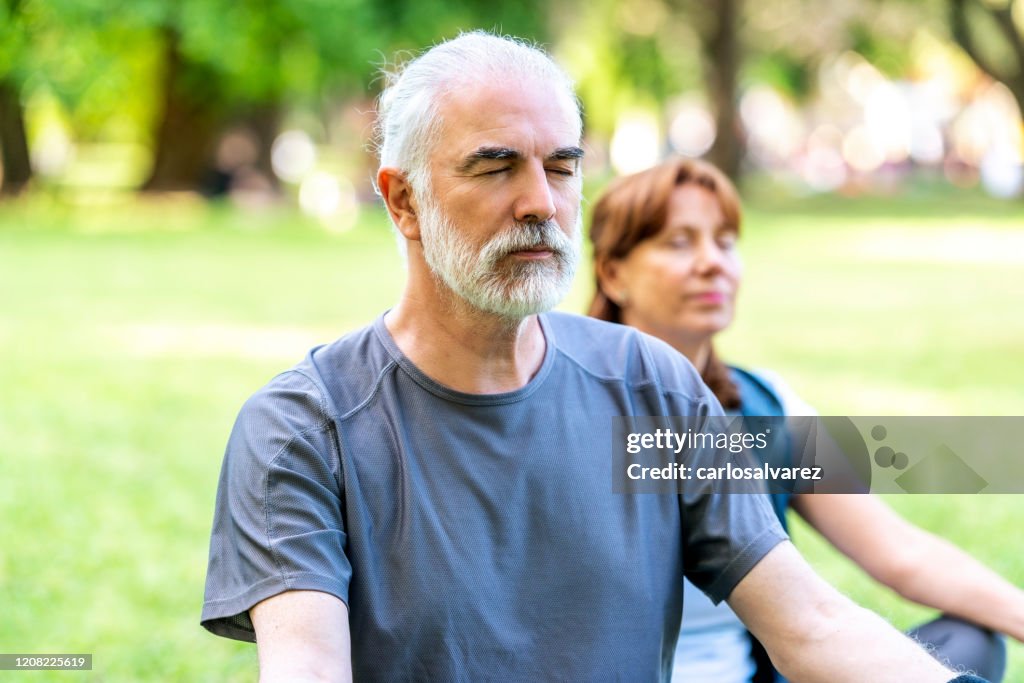 Senior Couple Doing Yoga High-Res Stock Photo - Getty Images Senior Couple Doing Yoga High-Res Stock Photo - Getty Images