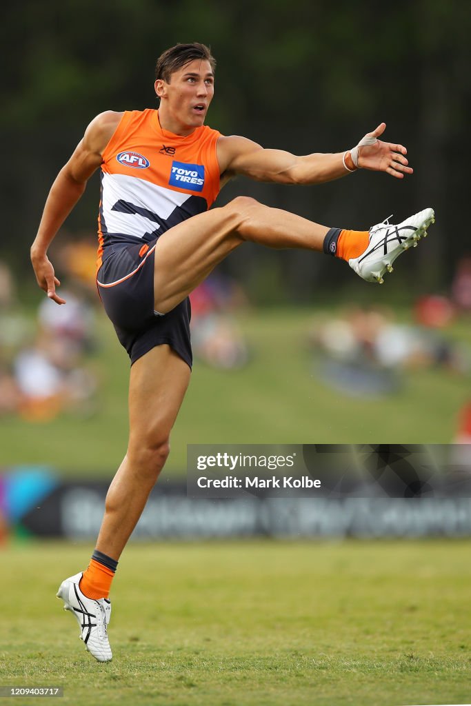 Isaac Cumming of the Giants kicks during the 2020 AFL Marsh Community ... Isaac Cumming of the Giants kicks during the 2020 AFL Marsh Community ...
