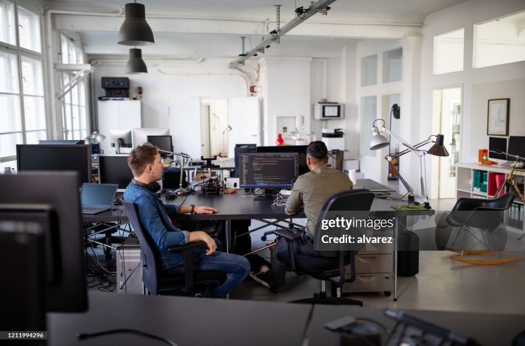 Computer Programmers Working On A New Project High-res Stock Photo