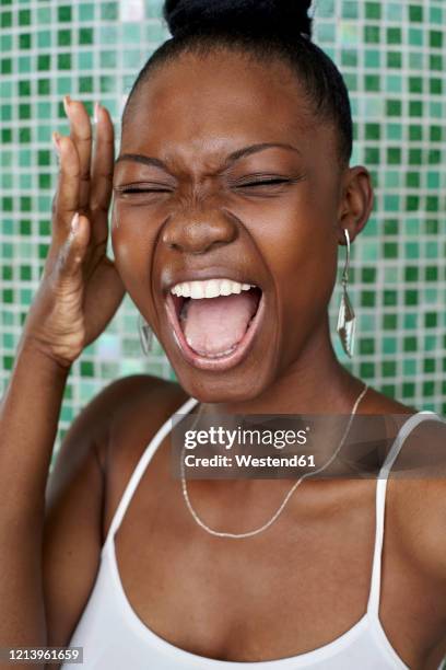 Woman Laughing Hysterically Photos And Premium High Res Pictures