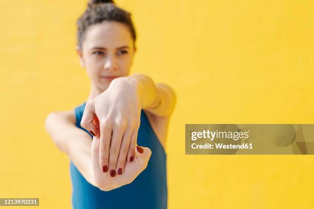 Woman Stretches Hand Photos And Premium High Res Pictures Getty Images