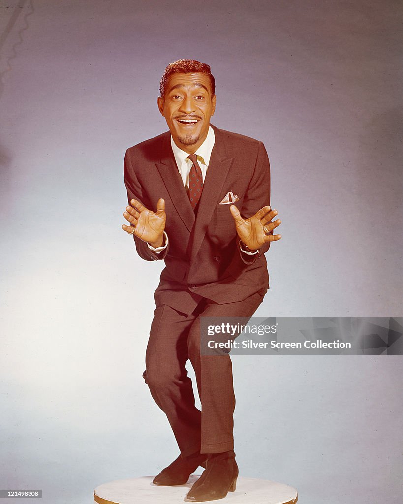 Sammy Davis Jr , US singer, actor and dancer, holding a dance pose in ... Sammy Davis Jr , US singer, actor and dancer, holding a dance pose in ...