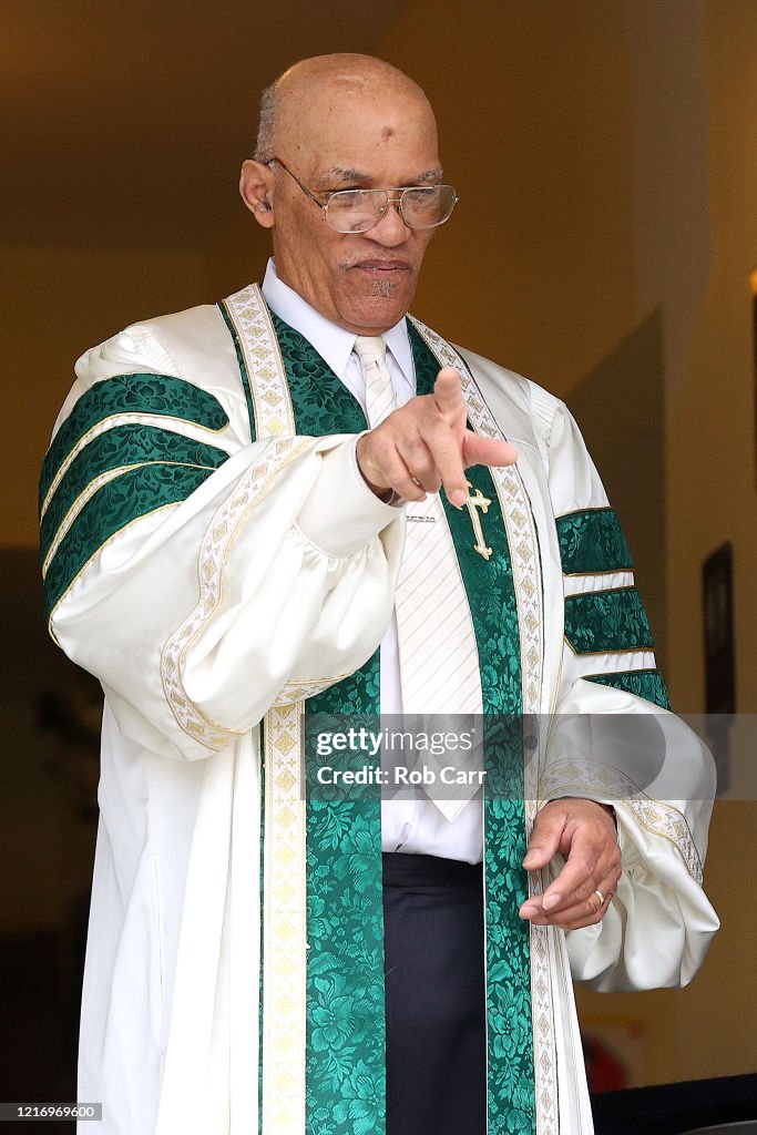 The Rev. Alvin Gwynn Sr. stands in the hallway of his church before ... The Rev. Alvin Gwynn Sr. stands in the hallway of his church before ...