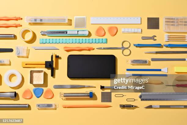 Fixing Phone Photos and Premium High Res Pictures - Getty Images Fixing Phone Photos and Premium High Res Pictures - Getty Images