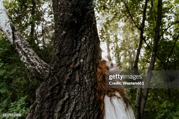 Tree Hugging Woman Photos And Premium High Res Pictures Getty Images